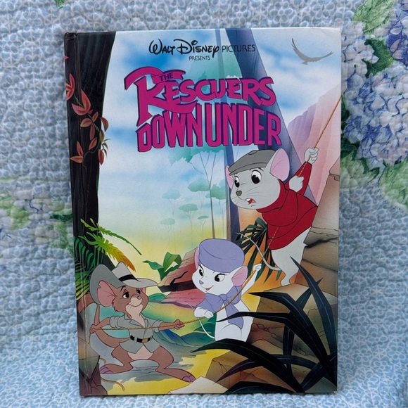 Walt Disney | Toys | The Rescuers Down Under Book Hardcover 99 | Poshmark